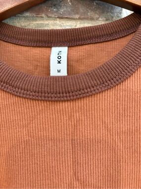 KOTN | Tops | Kotn Rust Orange Tank With Chocolate Rib Trim | Poshmark